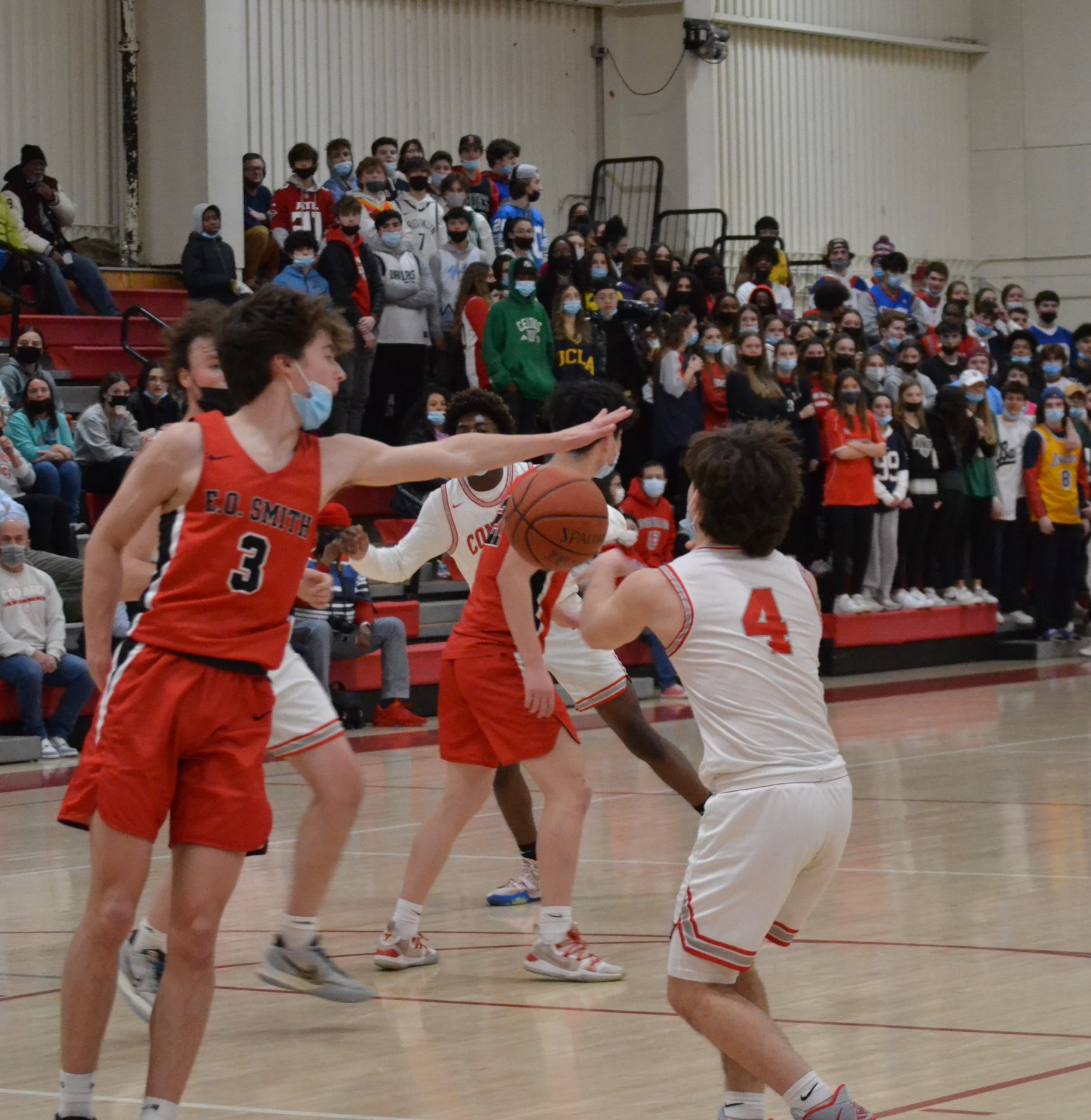 Junior Point Guard Declan McCann Passes Around A Smith Defender (2 ...