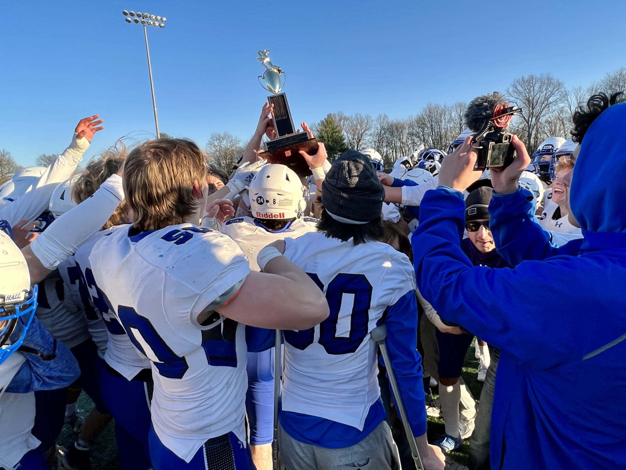 hoisting the trophy - We-Ha | West Hartford News