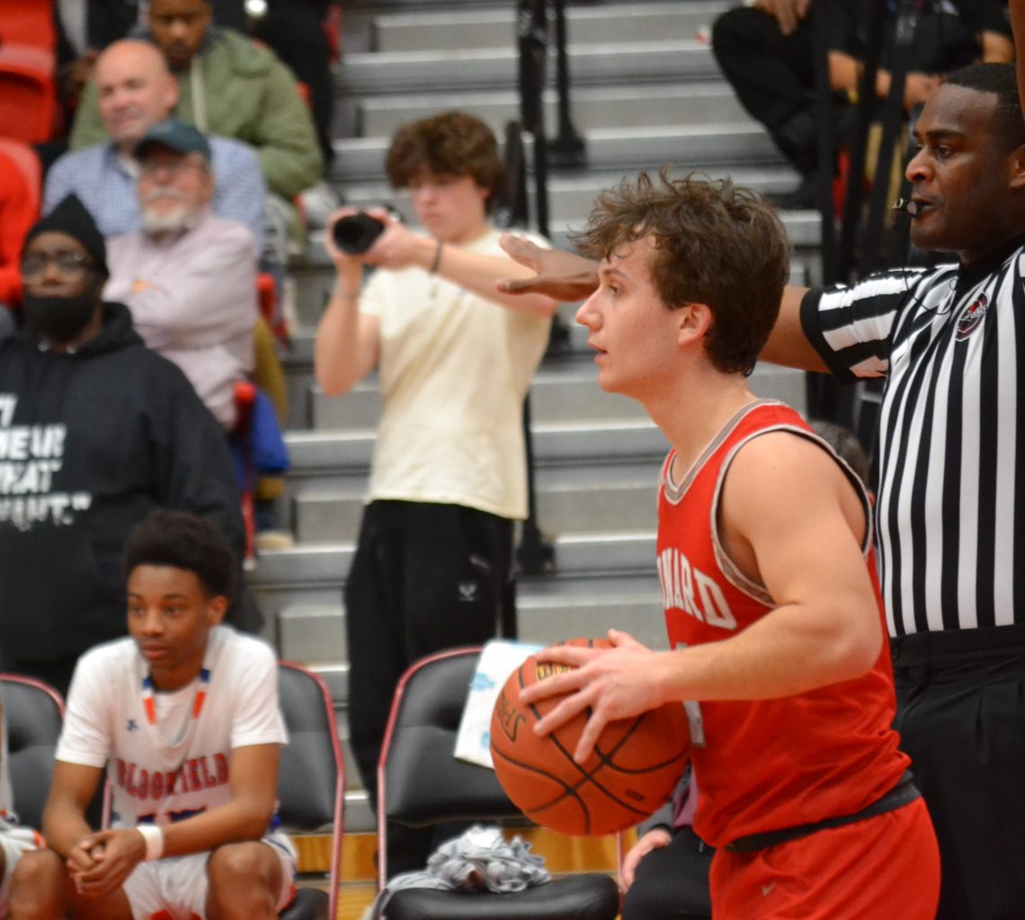 Declan McCann of Conard looks for options inbounding the ball - We-Ha ...