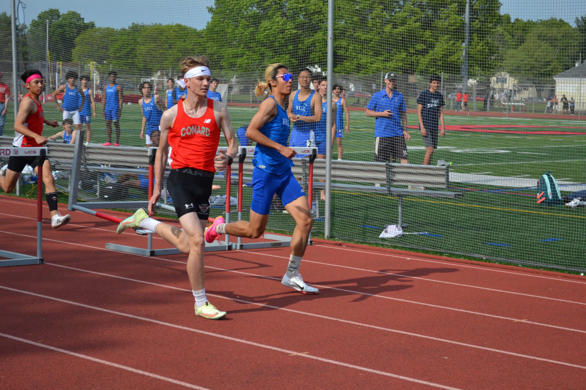 Crosstown Rivalry Leads to Great Performances for Hall and Conard Track ...