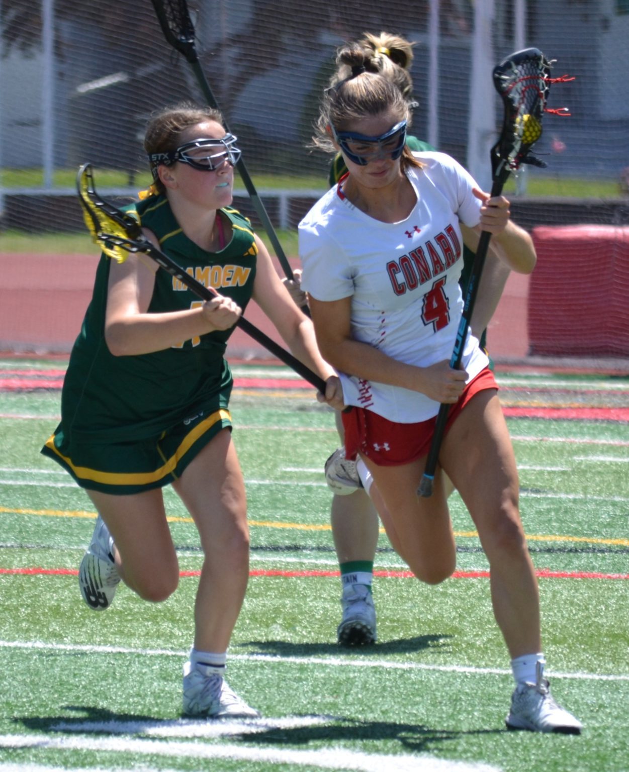Maddie Campbell of Conard turns the corner on a Hamden defender in the Red Wolves win - We-Ha ...