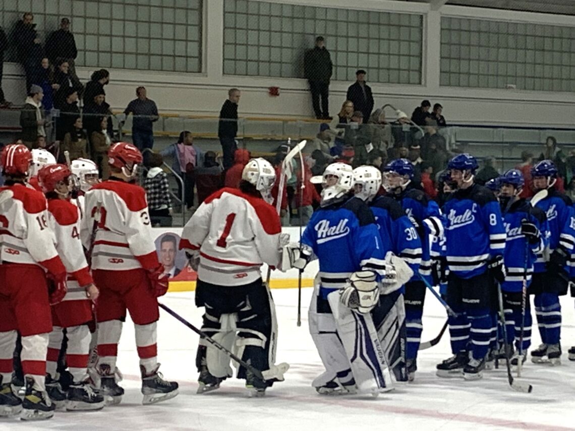 Goallies Blake Ittleson of Conard and Matt Bonner of Hall lead the ...