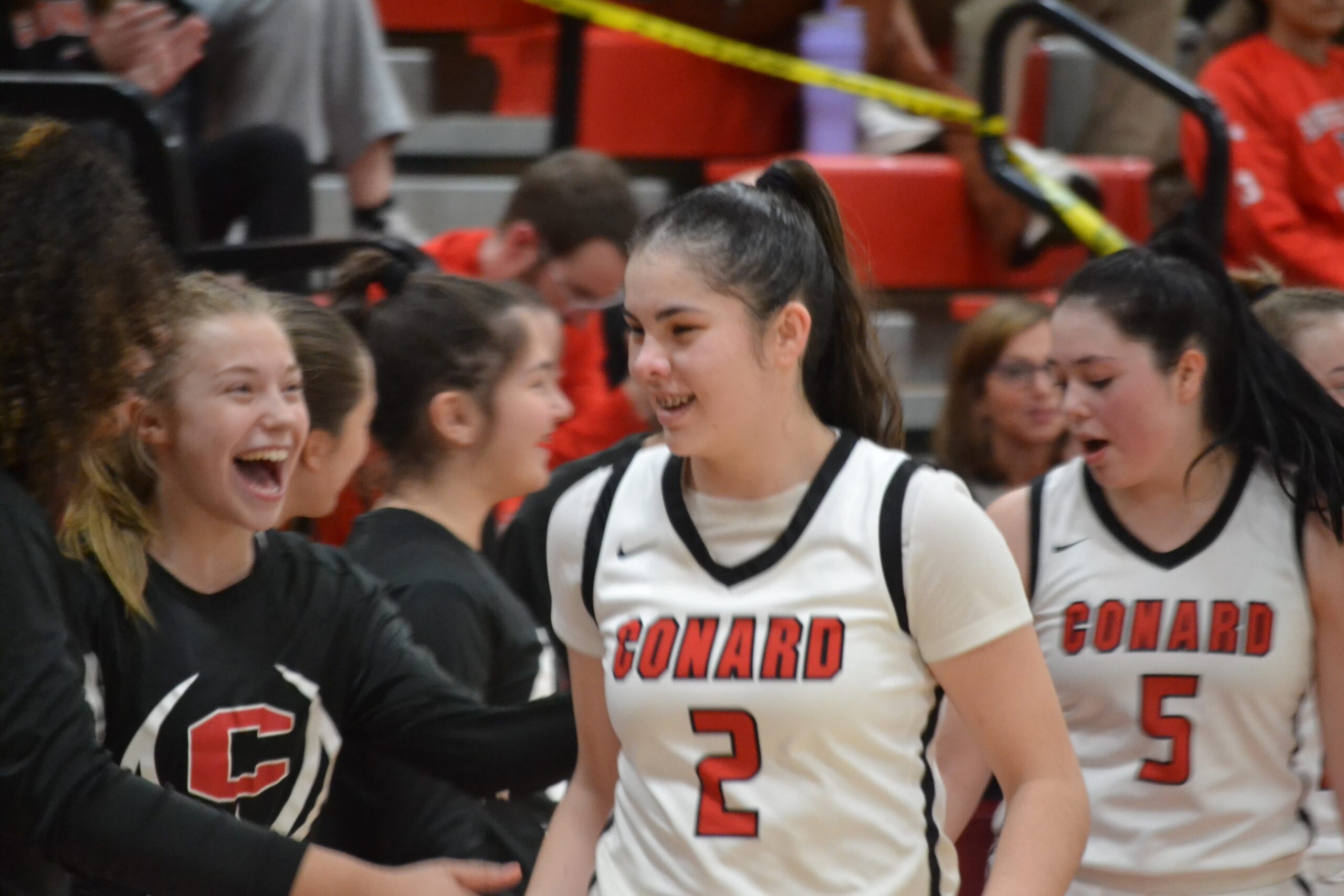 Emily Knowles (2) and Kathryn Torla (5) get congratulations from ...