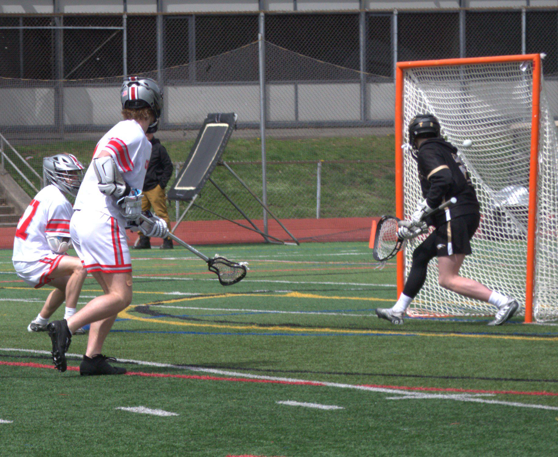 Liam Alver ( near) and Brady Cersosimo watch the ball go over Trumbull ...