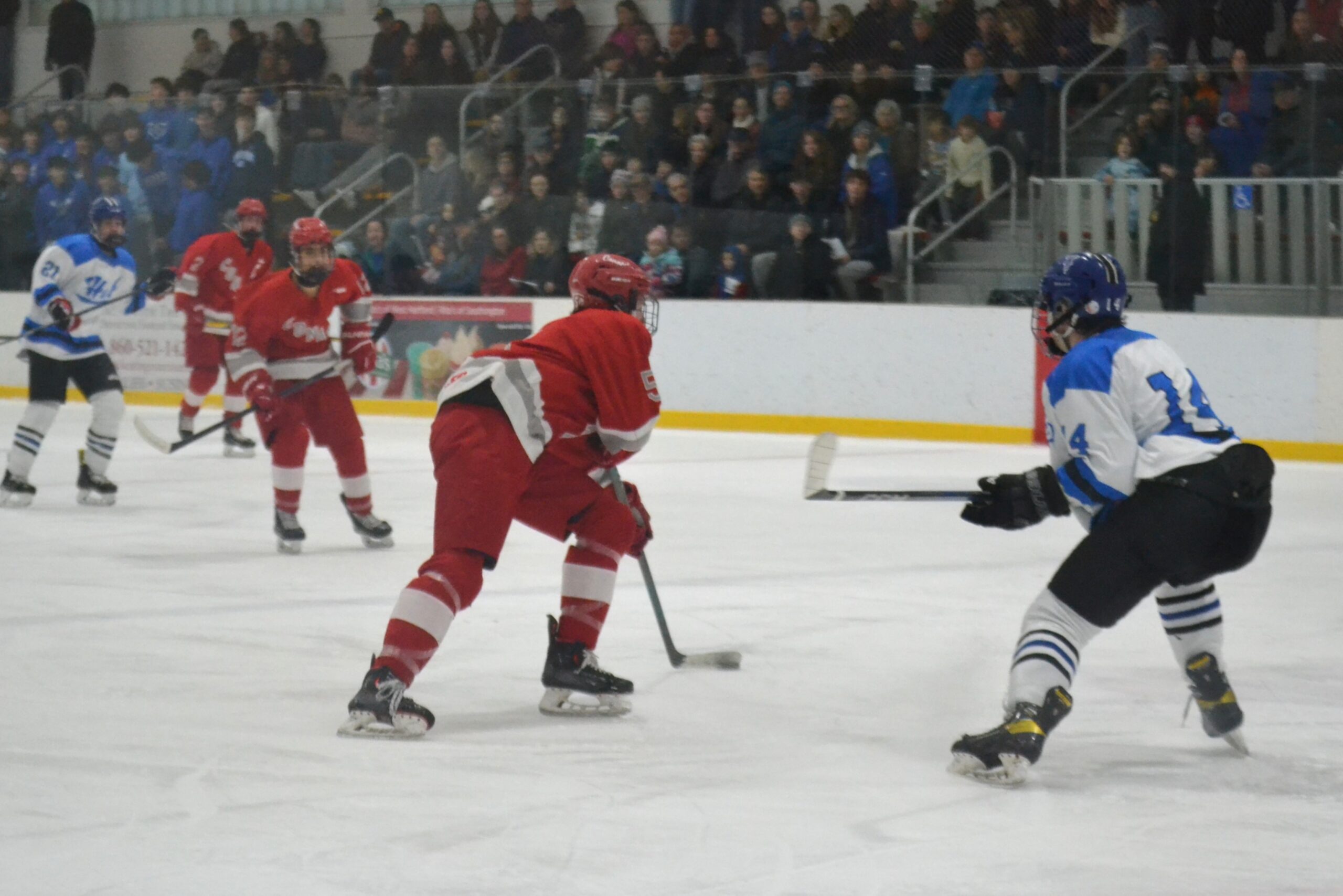 Torin McGoldrick of Conard looks to shoot around Hall's Declan Stone ...