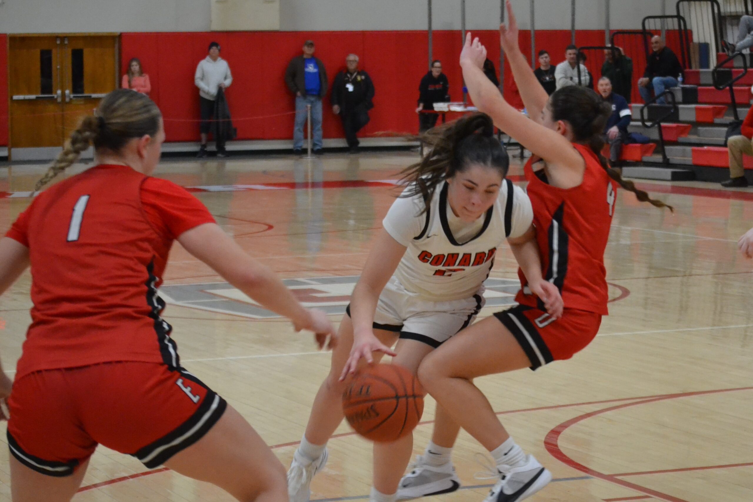 Emily Knowles splits defenders - We-Ha | West Hartford News