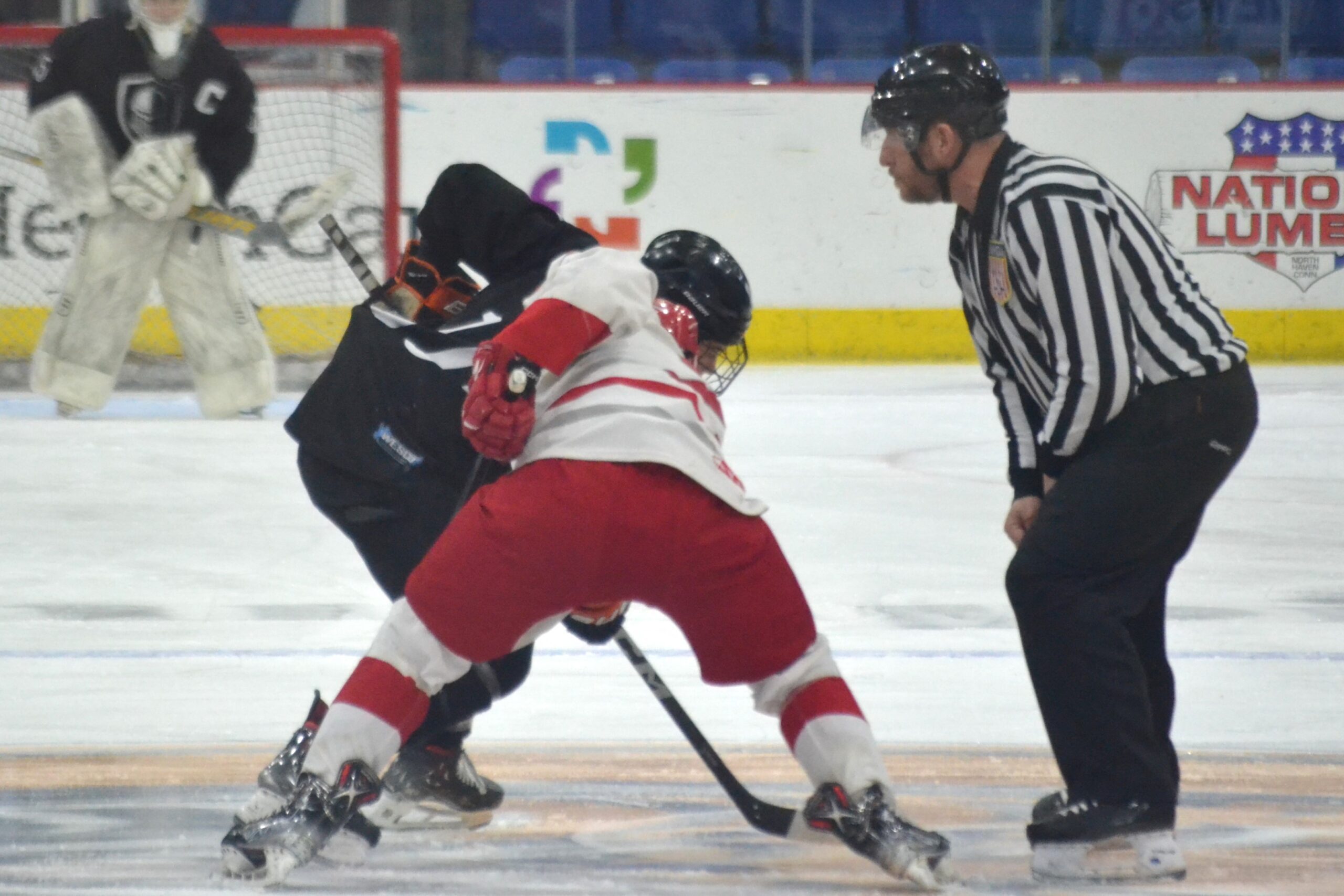 Brady Narus takes the opening faceoff for Conard - We-Ha | West ...